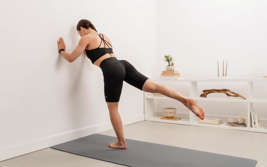 5 Plank Wall Exercises For A Powerful Core - BetterMe
